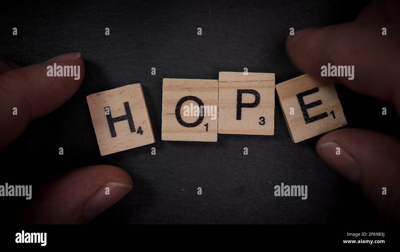 Writing the word Hope with wooden letters Stock Photo - Alamy