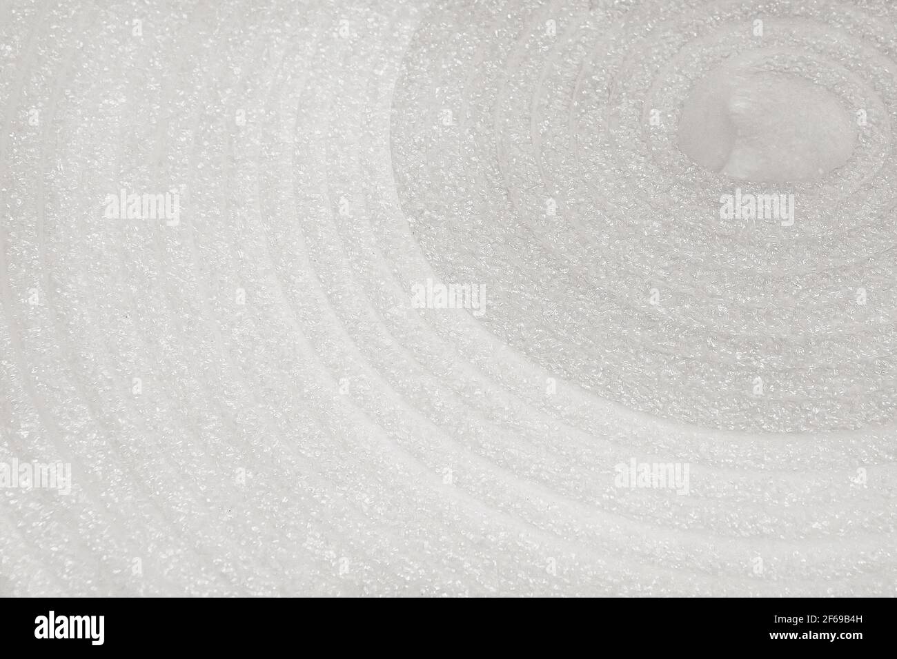 White foam in a roll close-up, building, insulation material texture ...