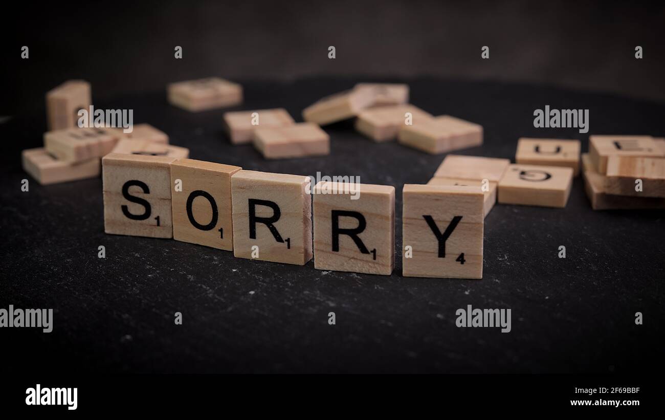 Writing the word Sorry with wooden letters Stock Photo - Alamy