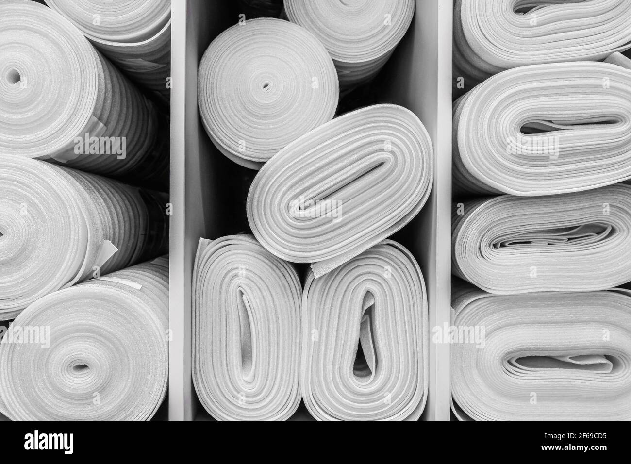 Industrial white foam rolls or thermal insulation materials in a ...