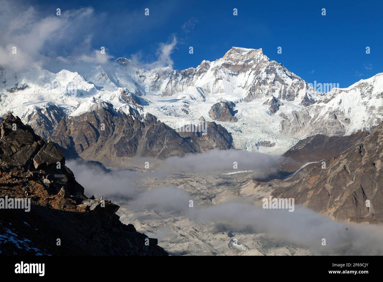 View from Gokyo Ri to mount Gyachung Kang 7952m within clouds near Cho ...