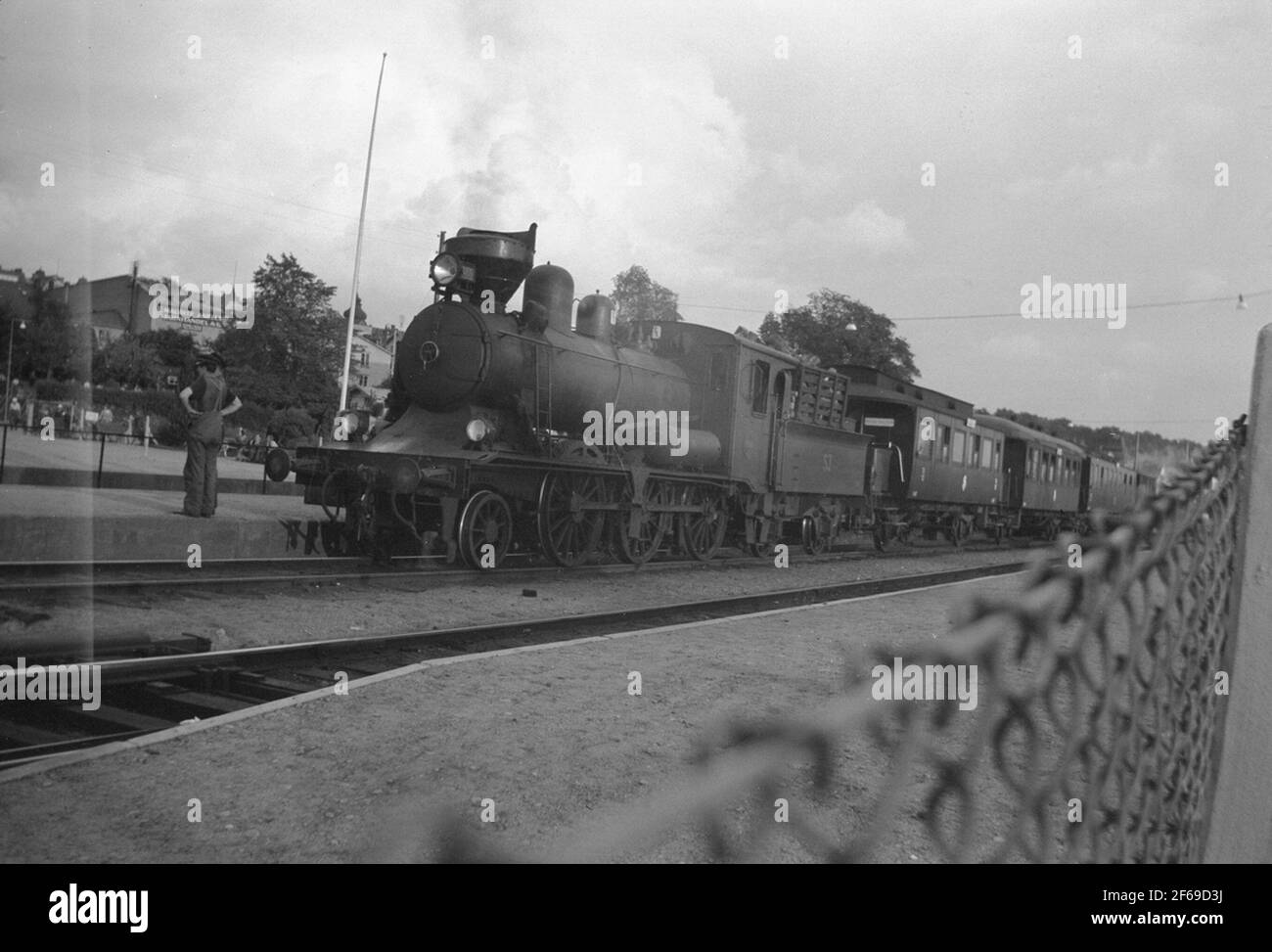 The state railways SJ L6 1580 (former VBHJ 20) with passenger train in ...