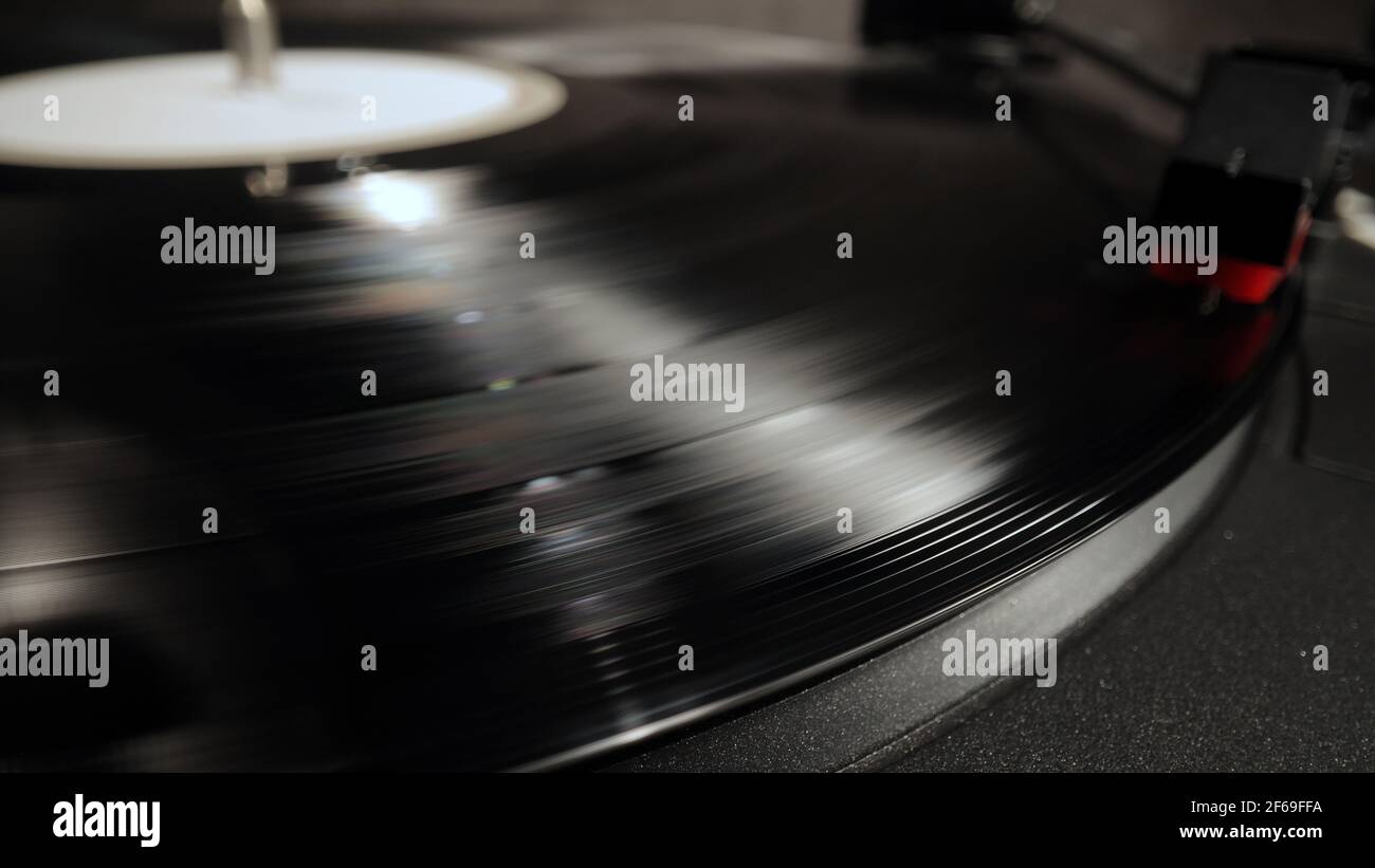 Record player in close-up - playing a vinyl Stock Photo - Alamy