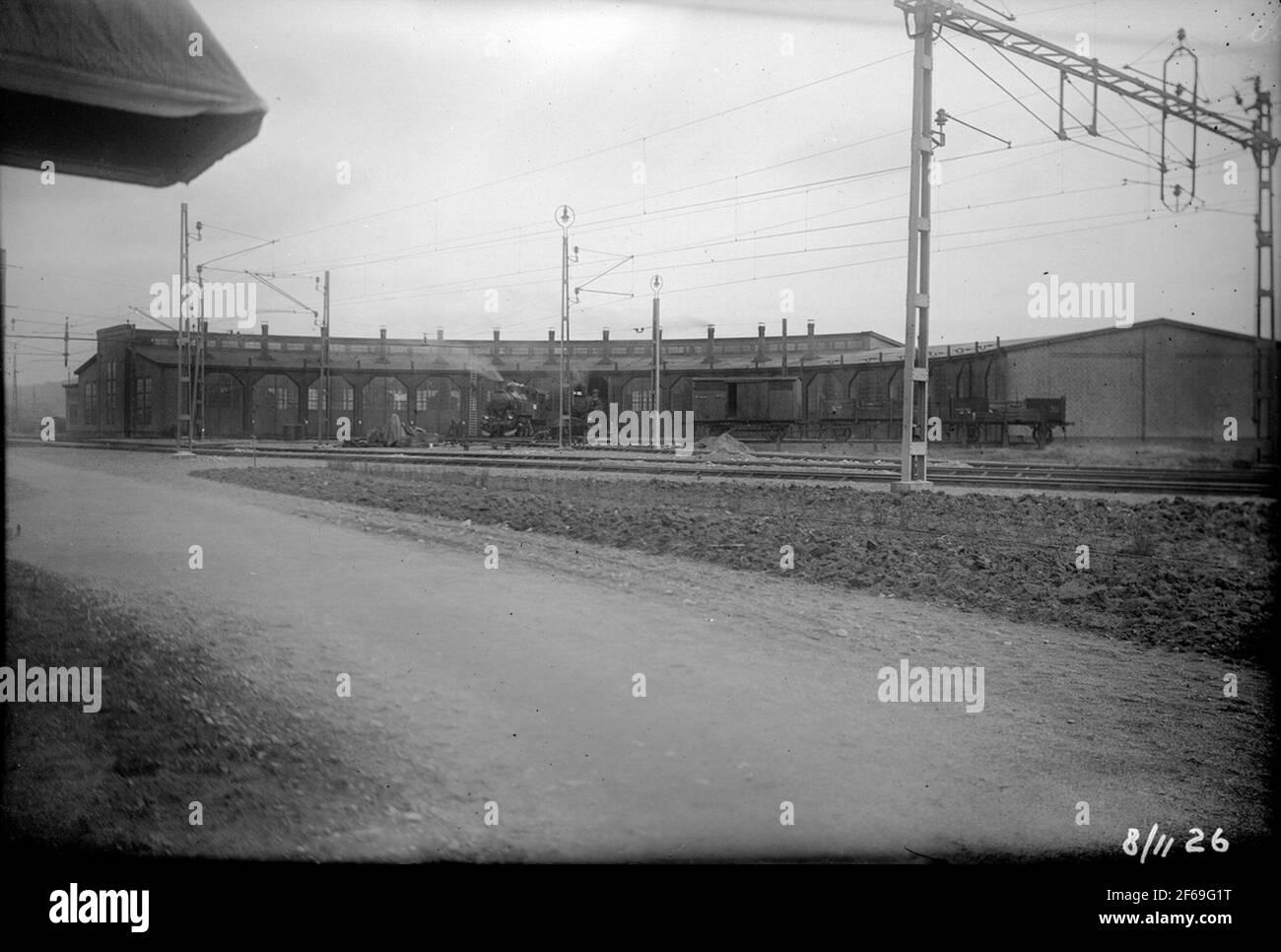 The locomotive station with the state's railways, SJ S and a road and a ...