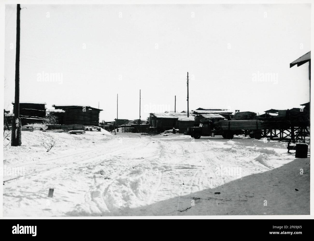 Sawmill in narrow bay Stock Photo - Alamy
