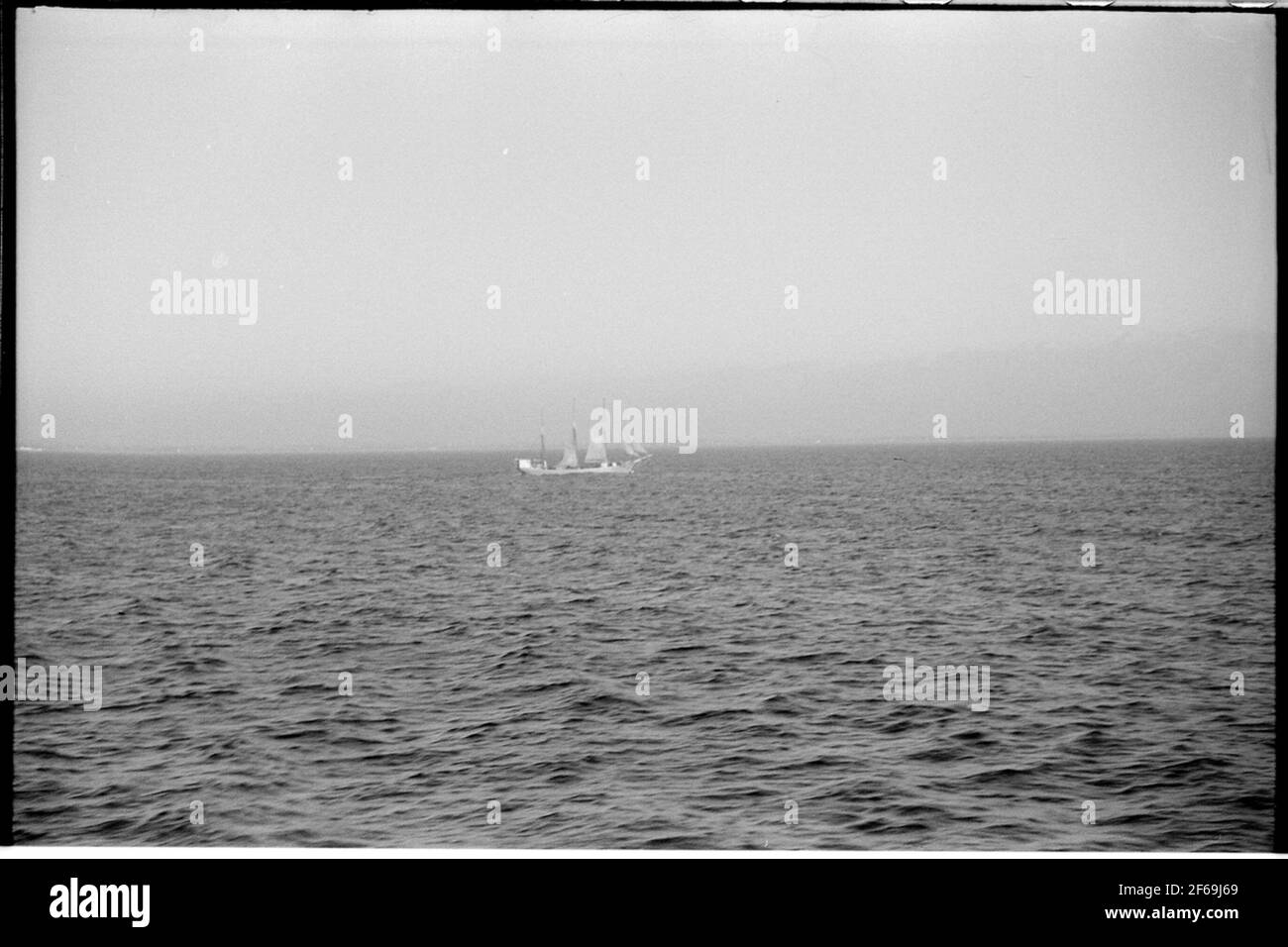 Sailing ship out to sea Stock Photo - Alamy