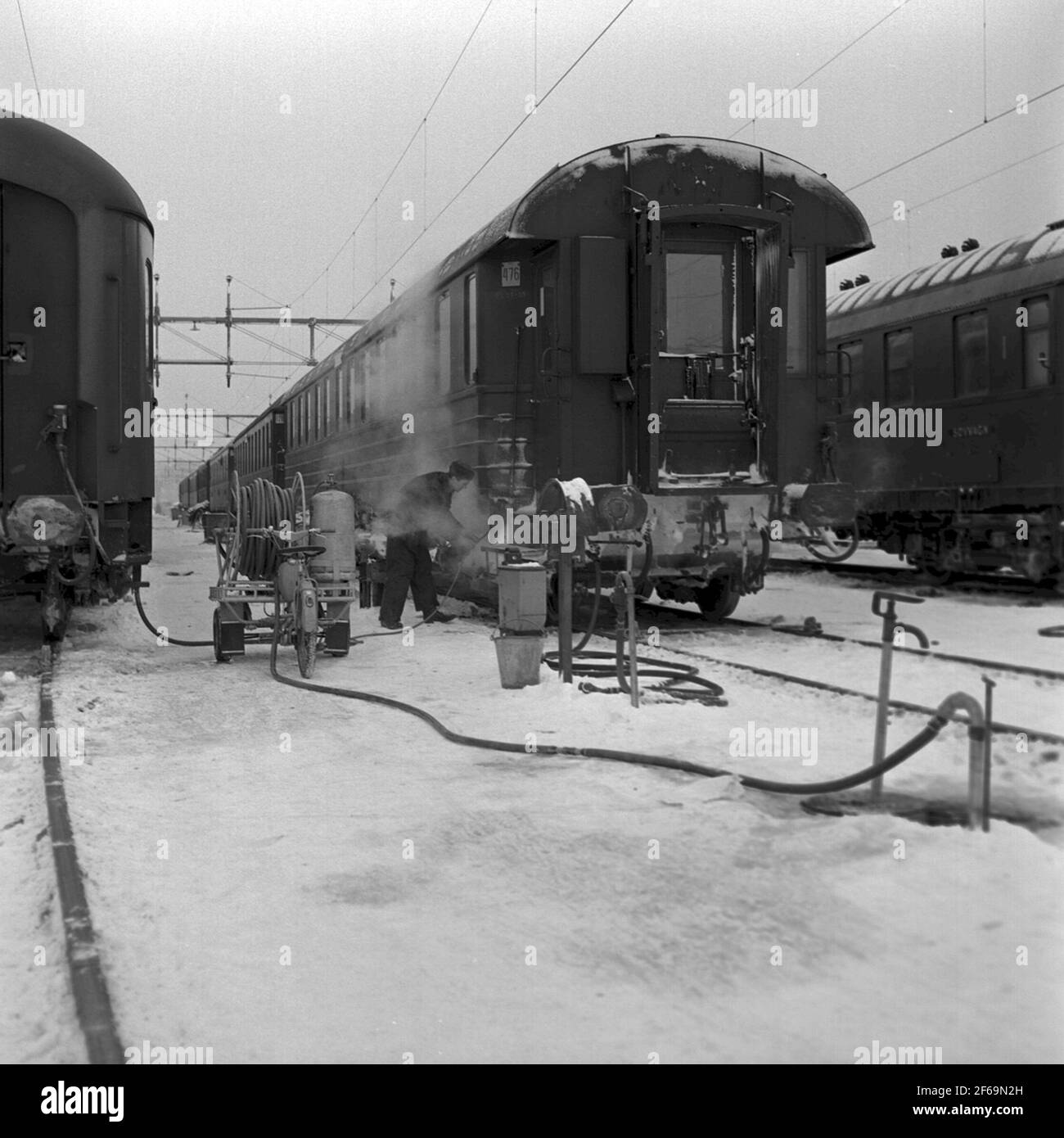 Wagon washing. Pump device for carriage wash mounted on moped Stock ...