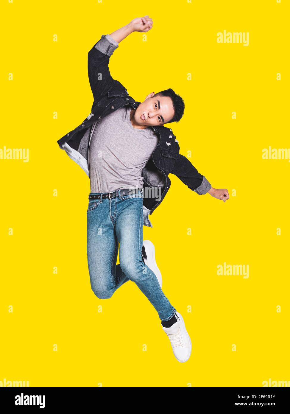 Handsome jumping young man hi-res stock photography and images - Alamy