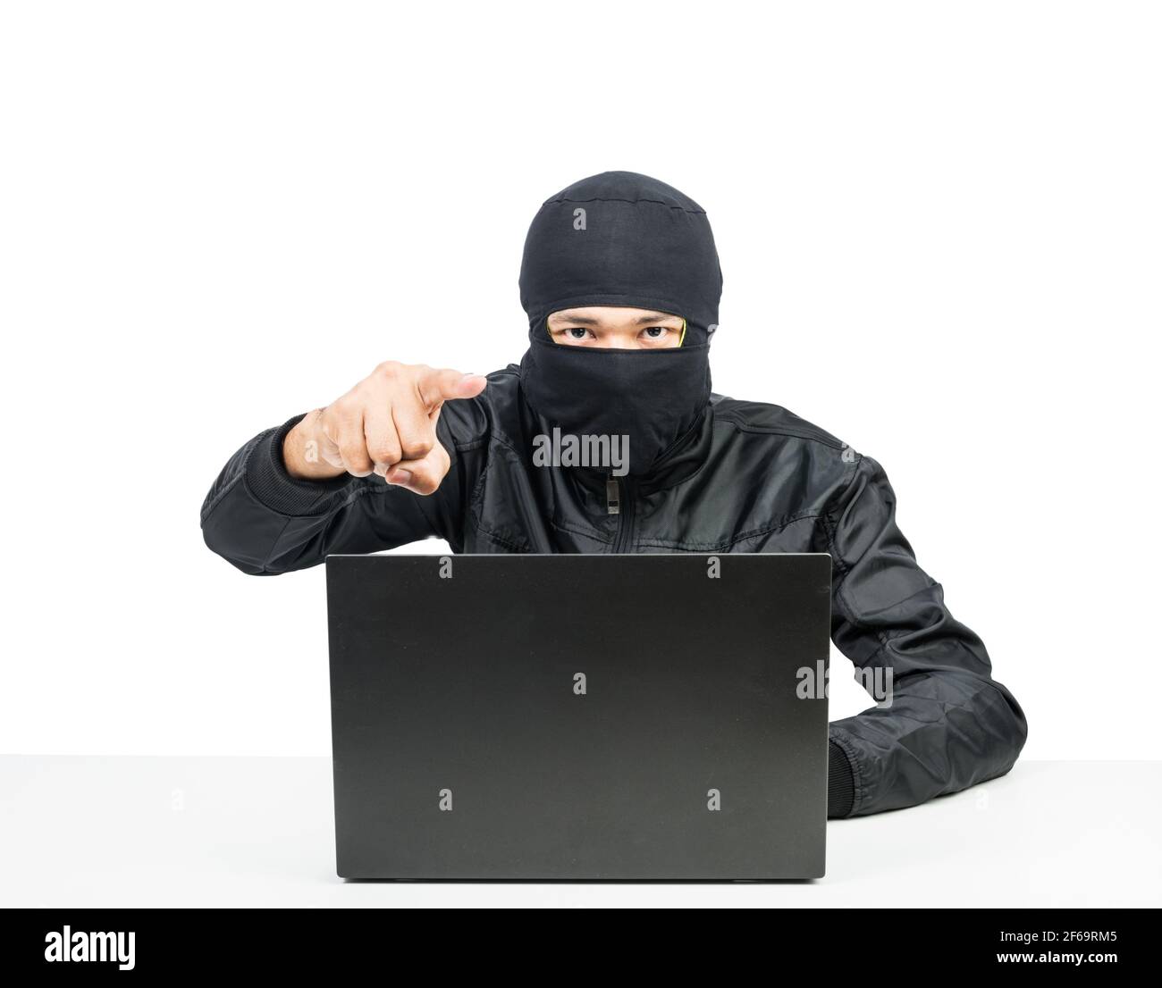 Hacker with laptop point finger isolate on white background Stock Photo ...