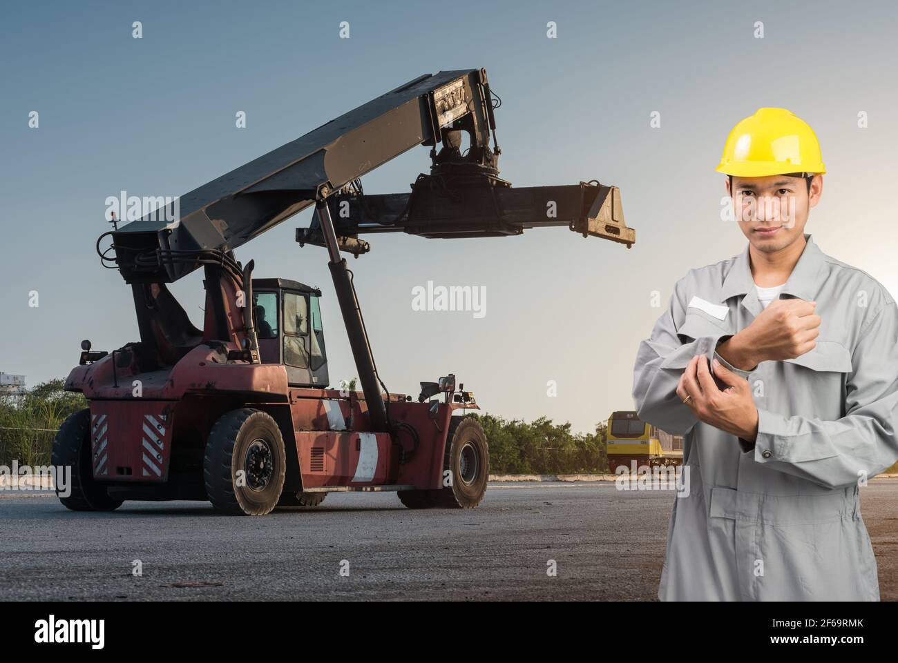 Foreman stand on front forklift loading Containers box to Logistic ...
