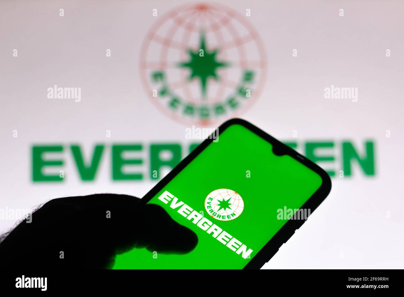 In this photo illustration Evergreen Marine Corporation logo seen ...