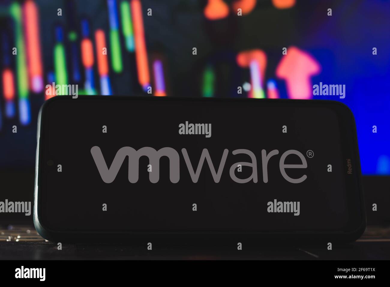 In this photo illustration VMware logo seen displayed on a smartphone ...