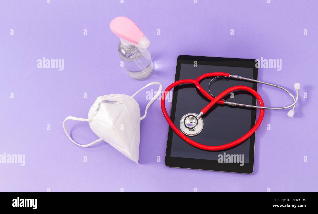 Diagnostic medical supplies with safety. Tablet with a stethoscope ...