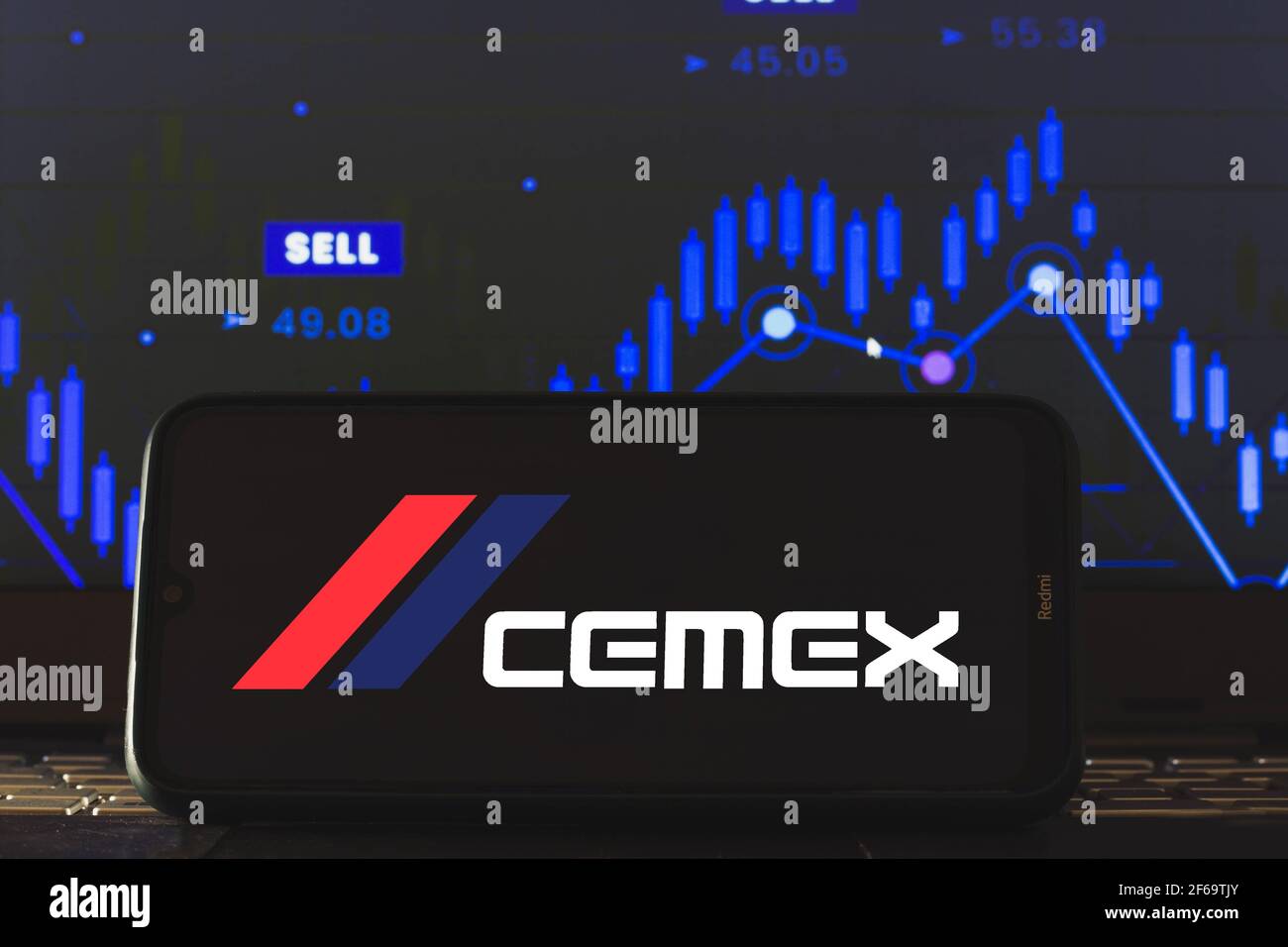In this photo illustration CEMEX logo seen displayed on a smartphone ...