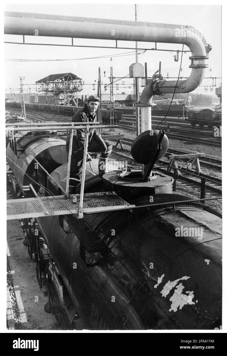 Loading oil trolley Stock Photo - Alamy