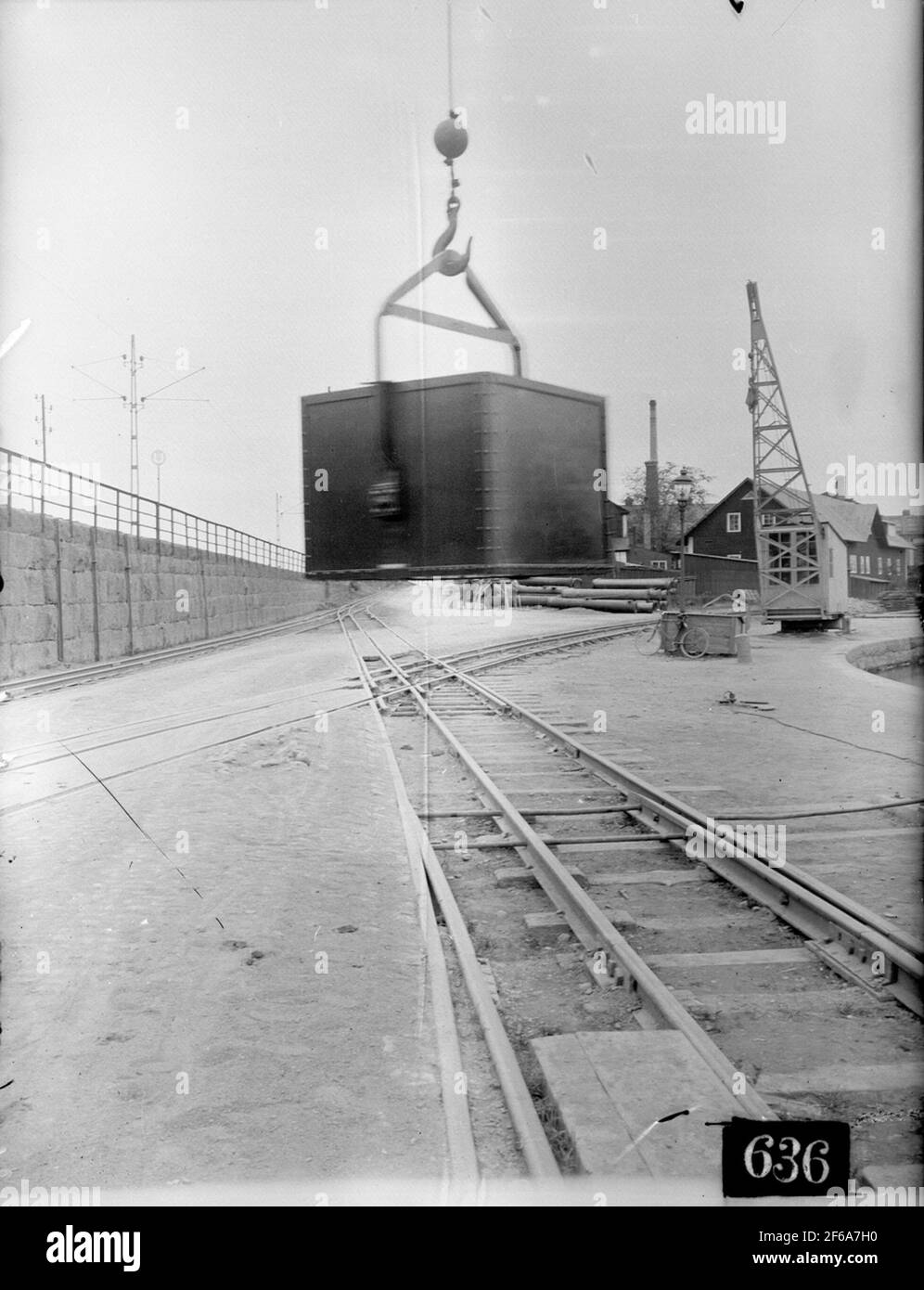 Carbon box in the harbor, hanging in crane Stock Photo - Alamy