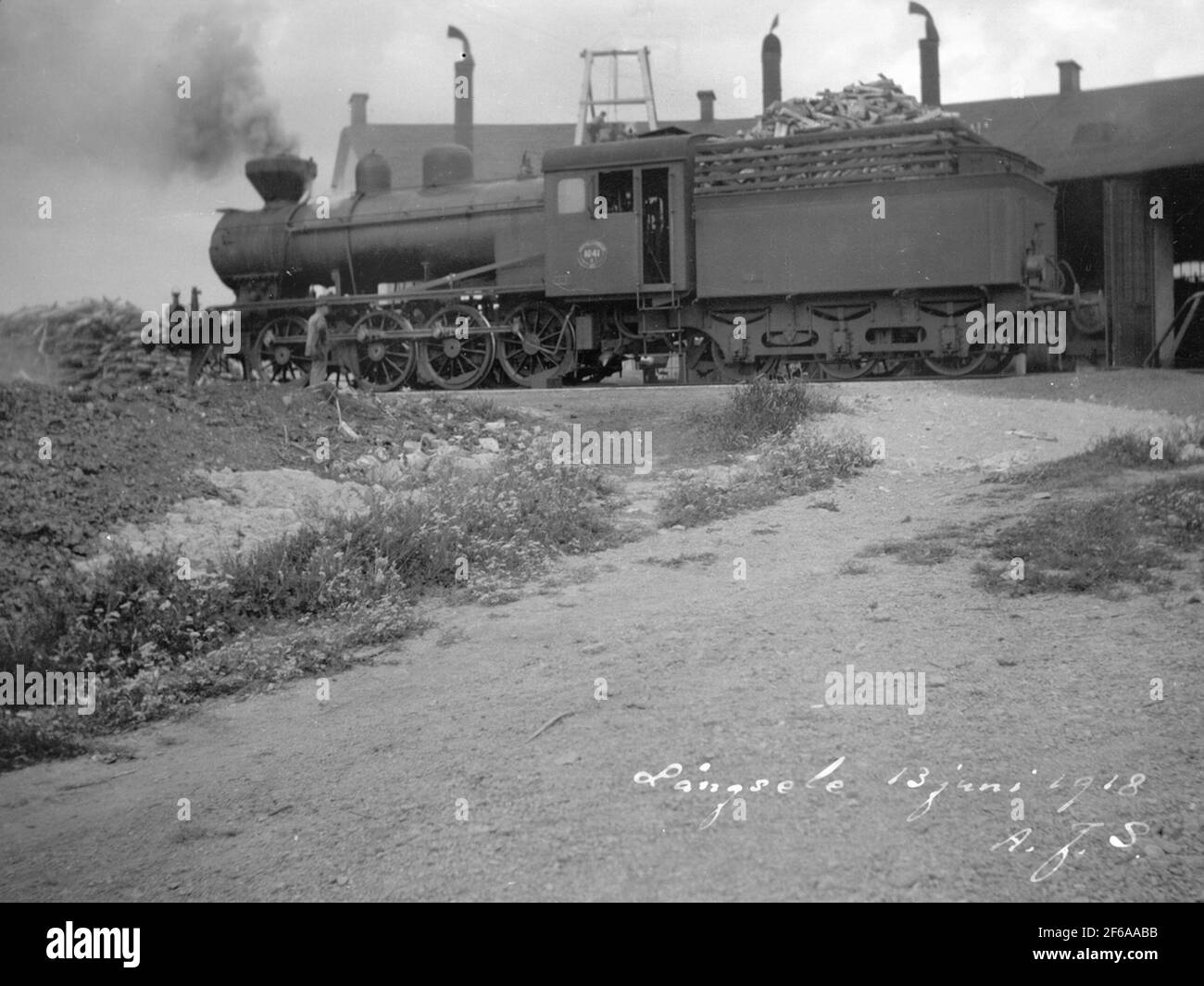 The state's railways, SJ E 1041. Wood-fired steam locomotive, wood in ...