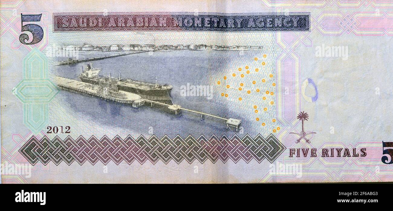 Saudi Arabia 5 riyals money background with the photo of king Abdullah ...
