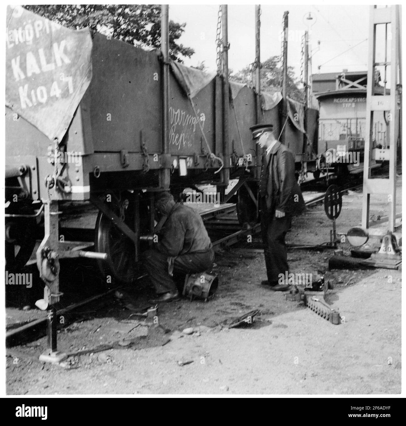 Work on freight wagon Stock Photo - Alamy