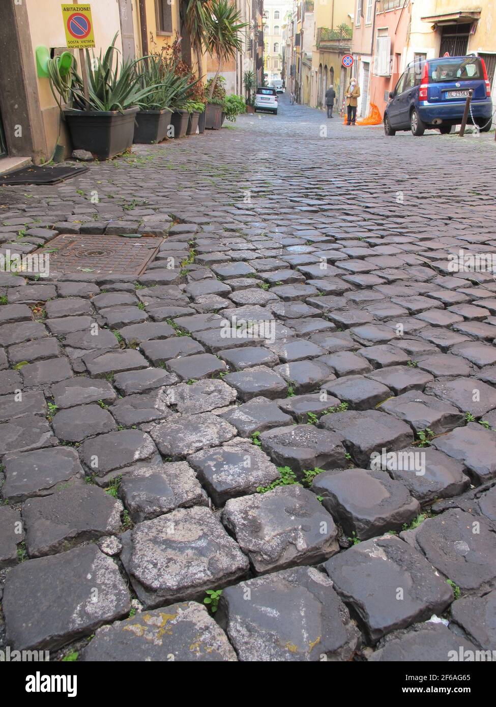 Rom, Italy. 25th Nov, 2020. Cobblestones in an alley. The relationship ...