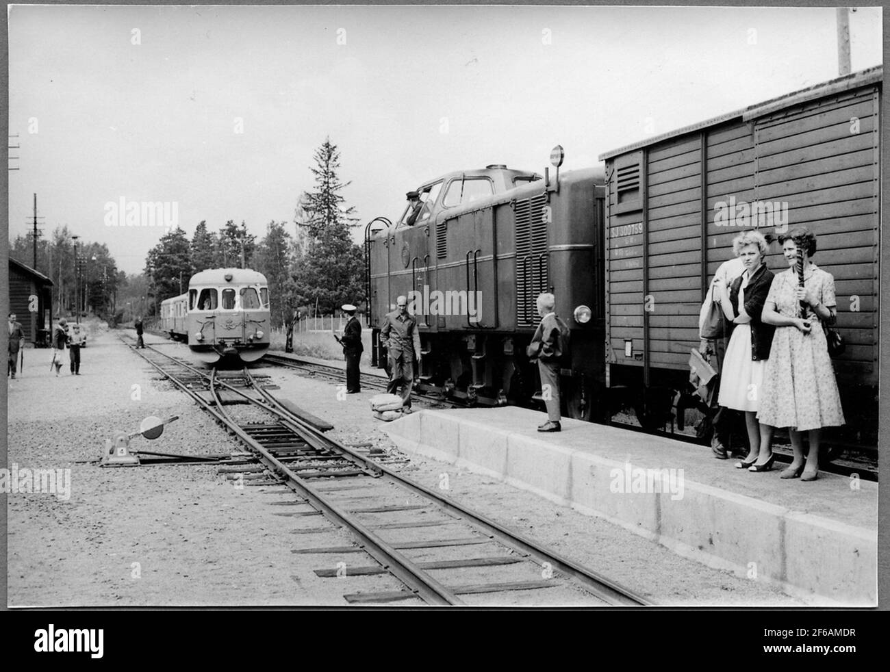Train meeting at Totebo Station. Passenger train 1541. Local goods 7794 ...