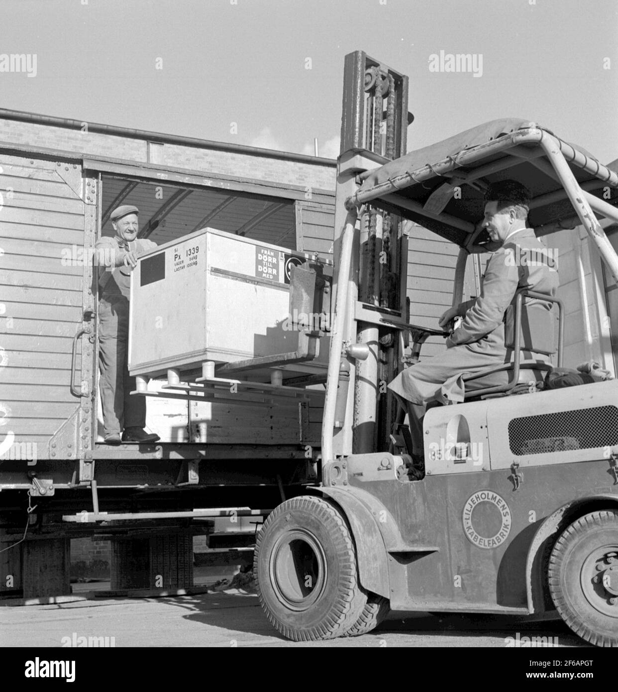 Small containers are loaded with truck, Liljeholmens cable work Stock ...