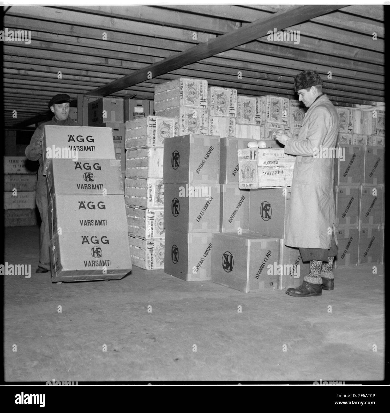 Loading work in goods magazine Stock Photo - Alamy