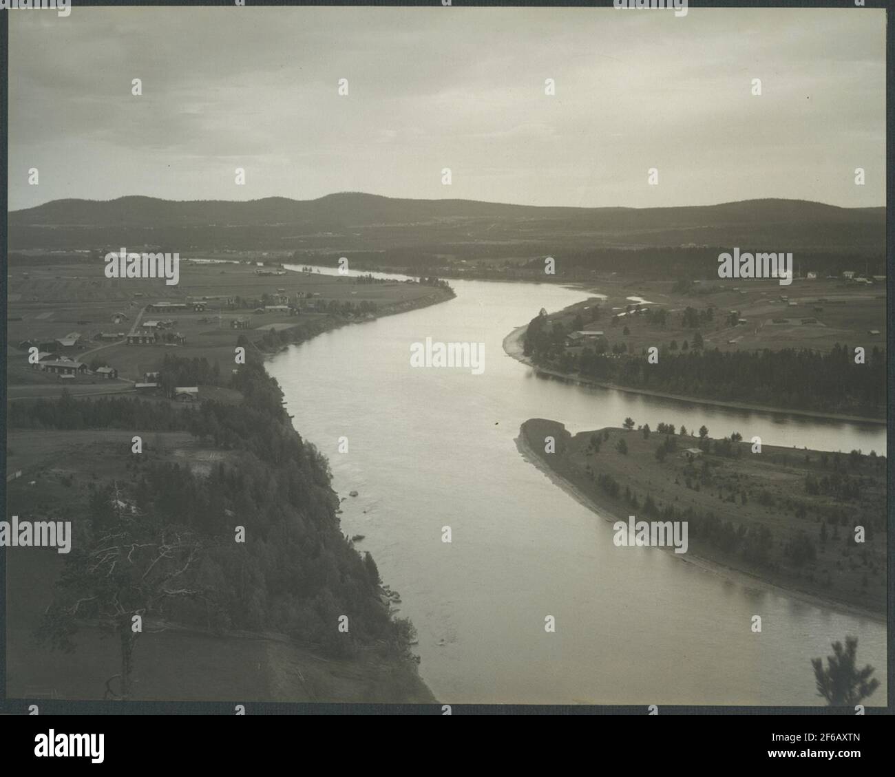 Pite river at Älvsbynkällsberget and Högheden in the background Stock ...