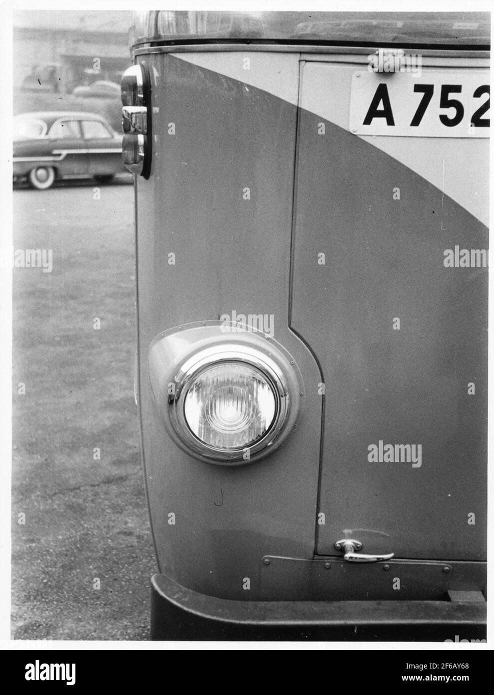 Headlights and sign on the bow of a bus Stock Photo - Alamy