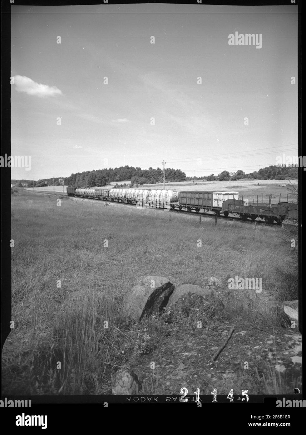 Freight train with large and mass goods containers Stock Photo - Alamy