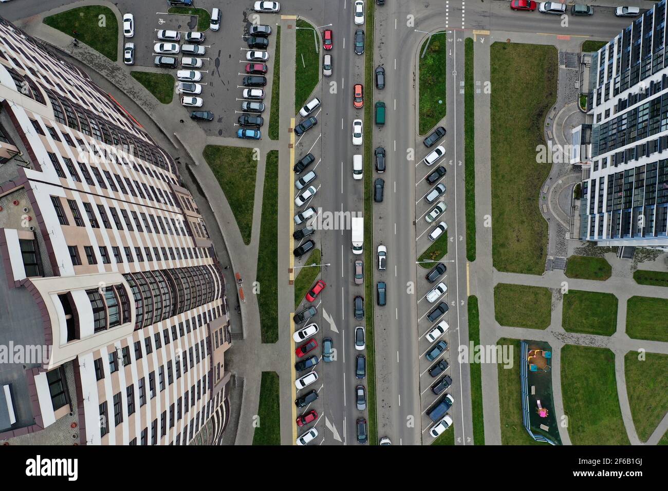 Road with cars near multistorey building top view Stock Photo - Alamy
