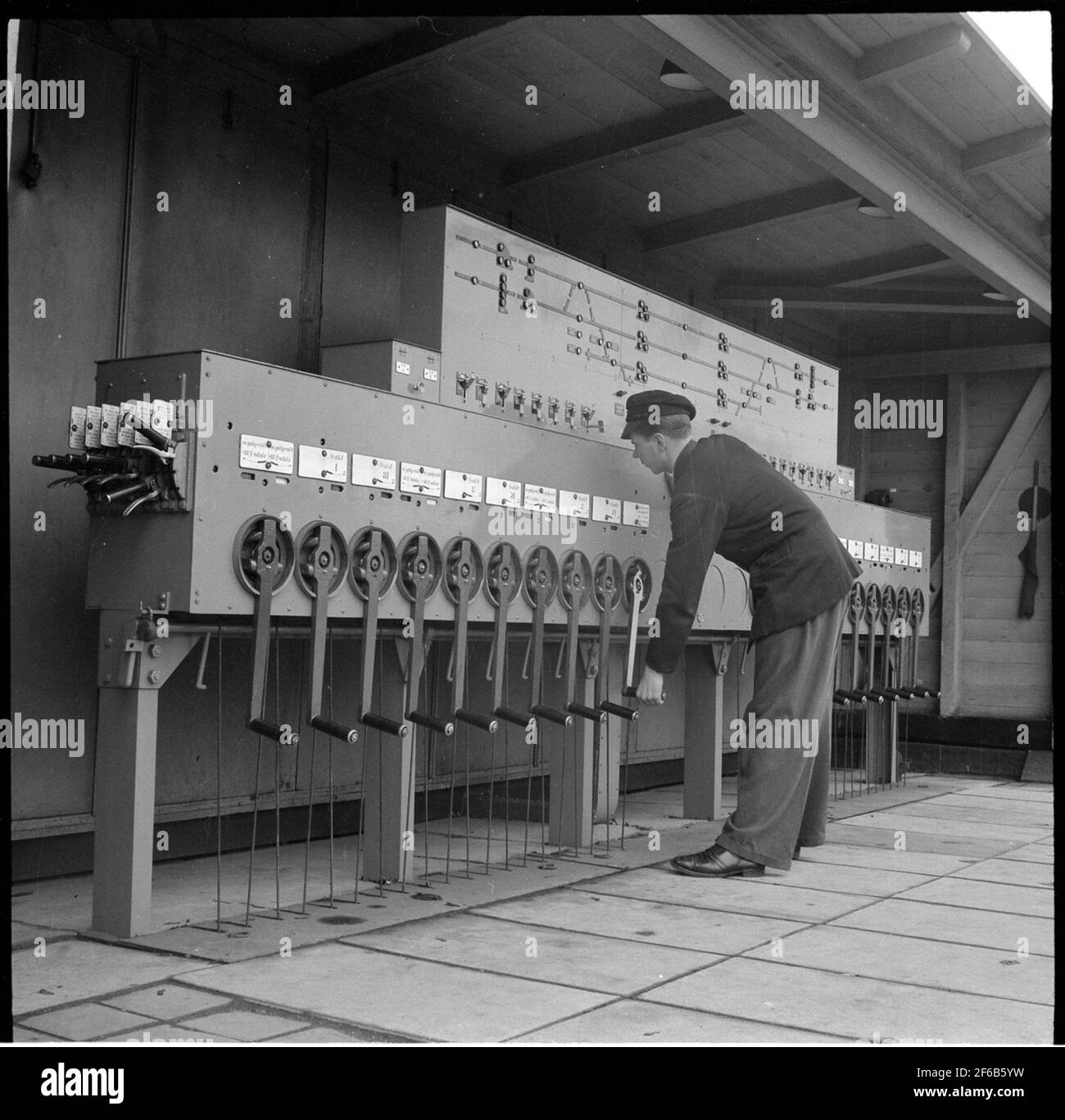Staff at switchgear Stock Photo - Alamy