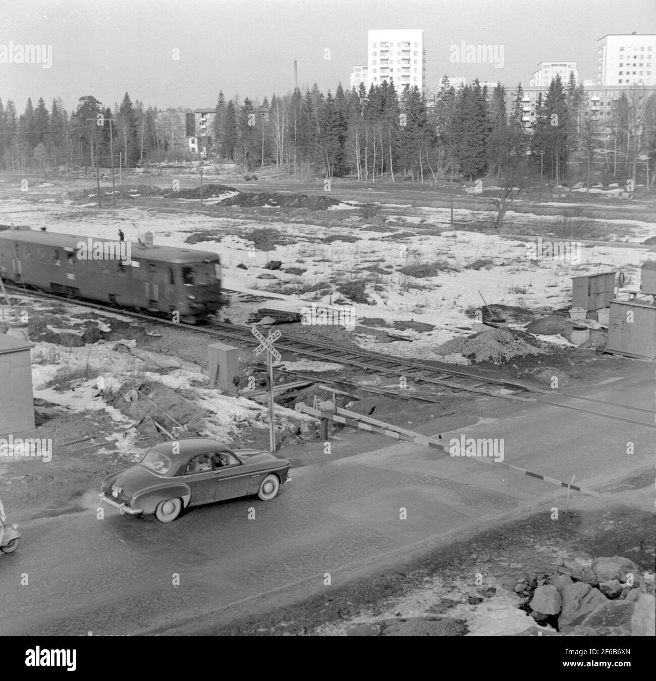 Cars at level crossing at the rye roadway in the direction of rye ...