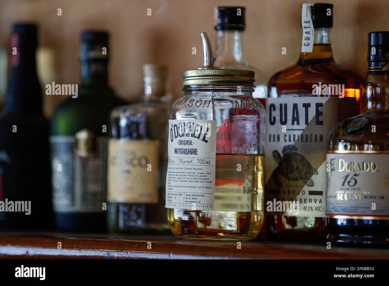 Berlin, Germany. 30th Mar, 2021. Various alcoholic beverages are lined up on a shelf in Bar ...