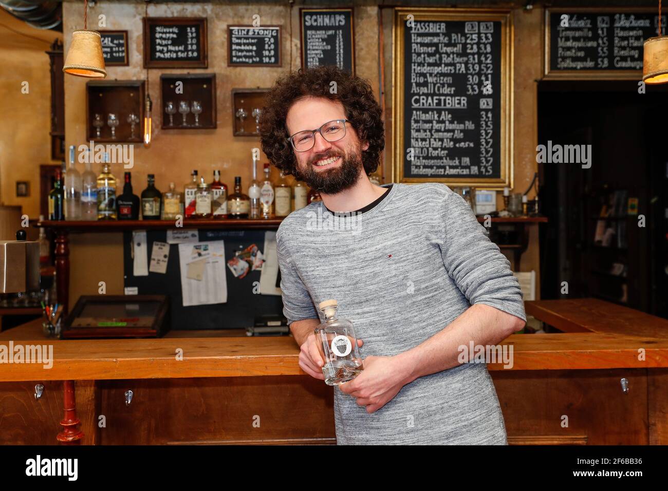 Berlin, Germany. 30th Mar, 2021. The inventor of "Rotbier Bierbrand" Jonas Mömken stands in ...
