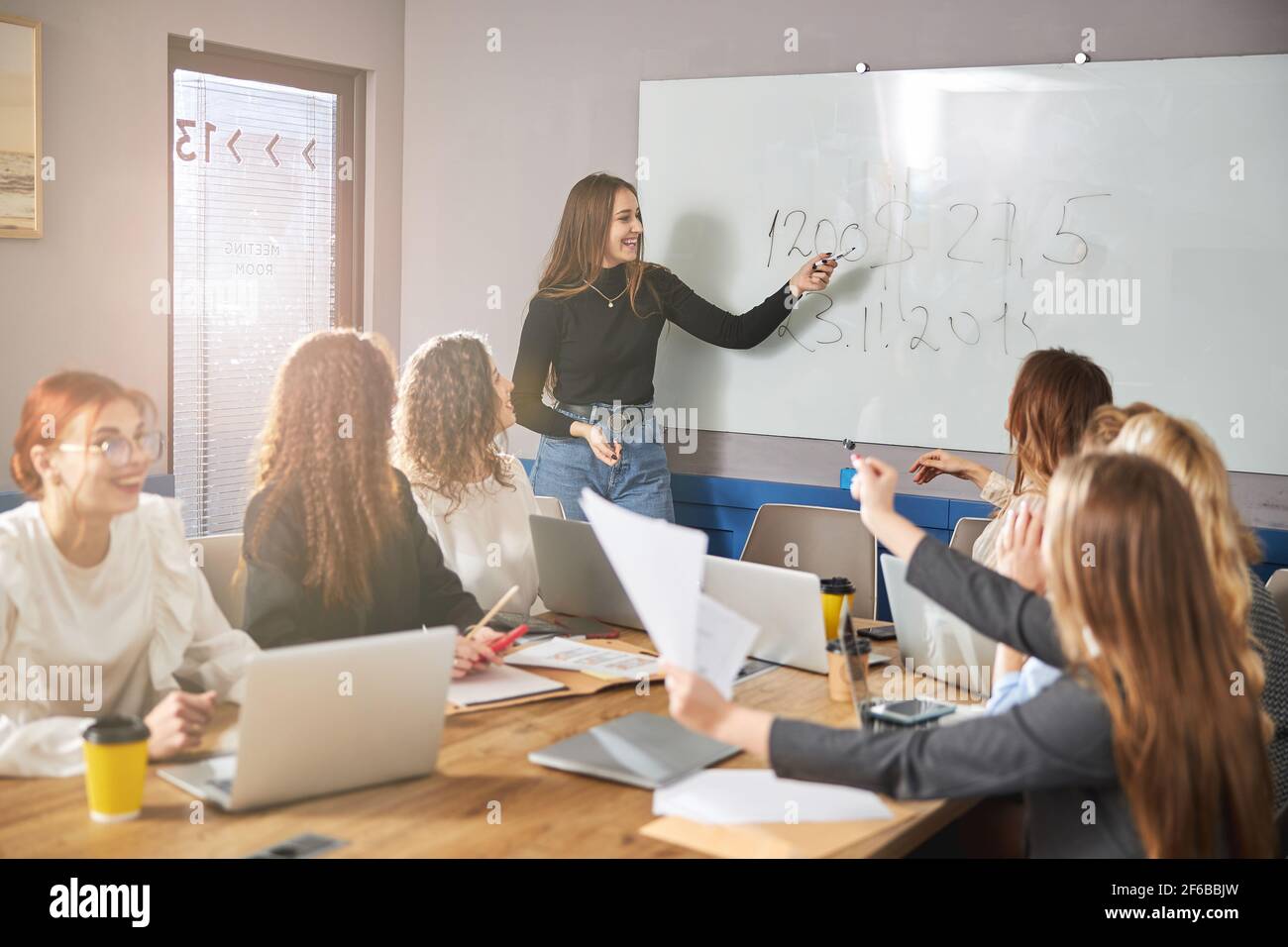 Business colleagues discussing project in modern office Stock Photo - Alamy