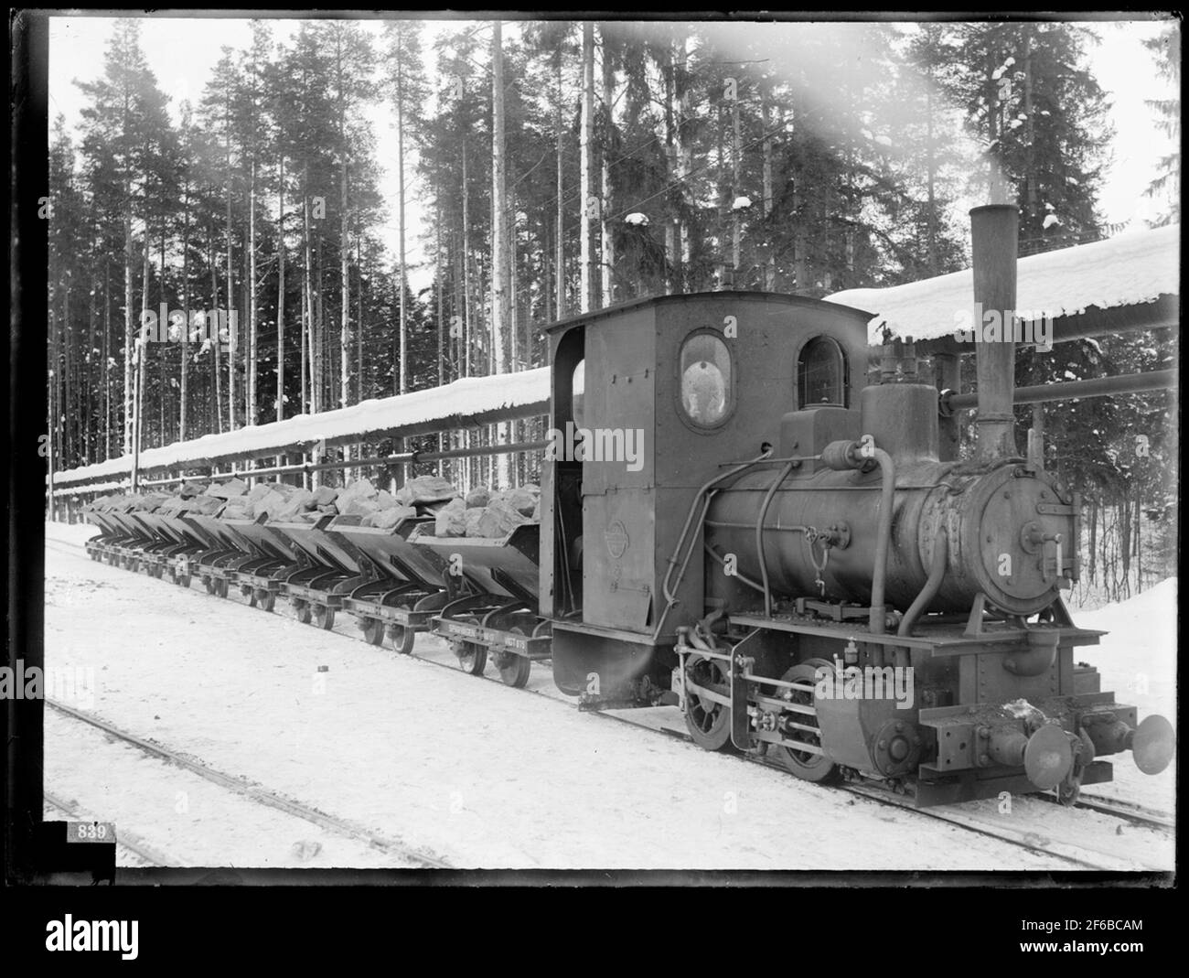 Orenstein & leash, O & K locomotive with tipping carts labeled track ...