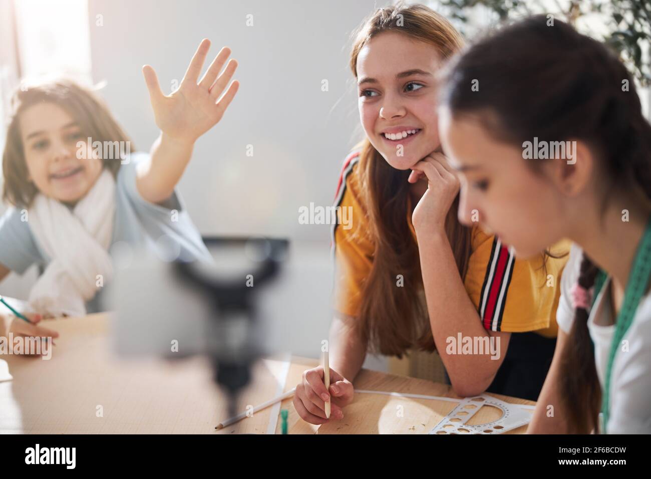 Joyful cute girls working hi-res stock photography and images - Alamy