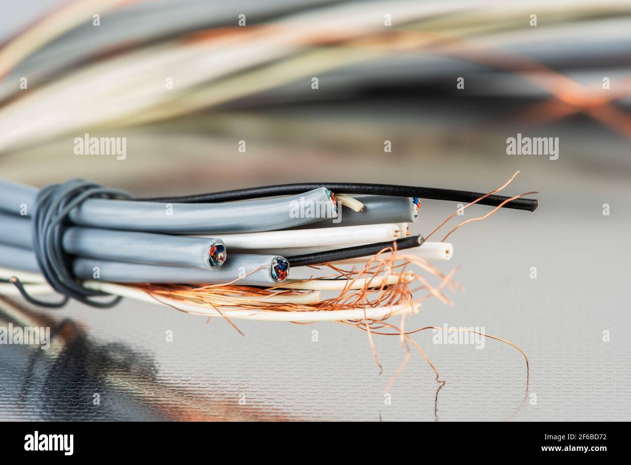 Electrical and telecommunication copper cable wire on shiny metal ...