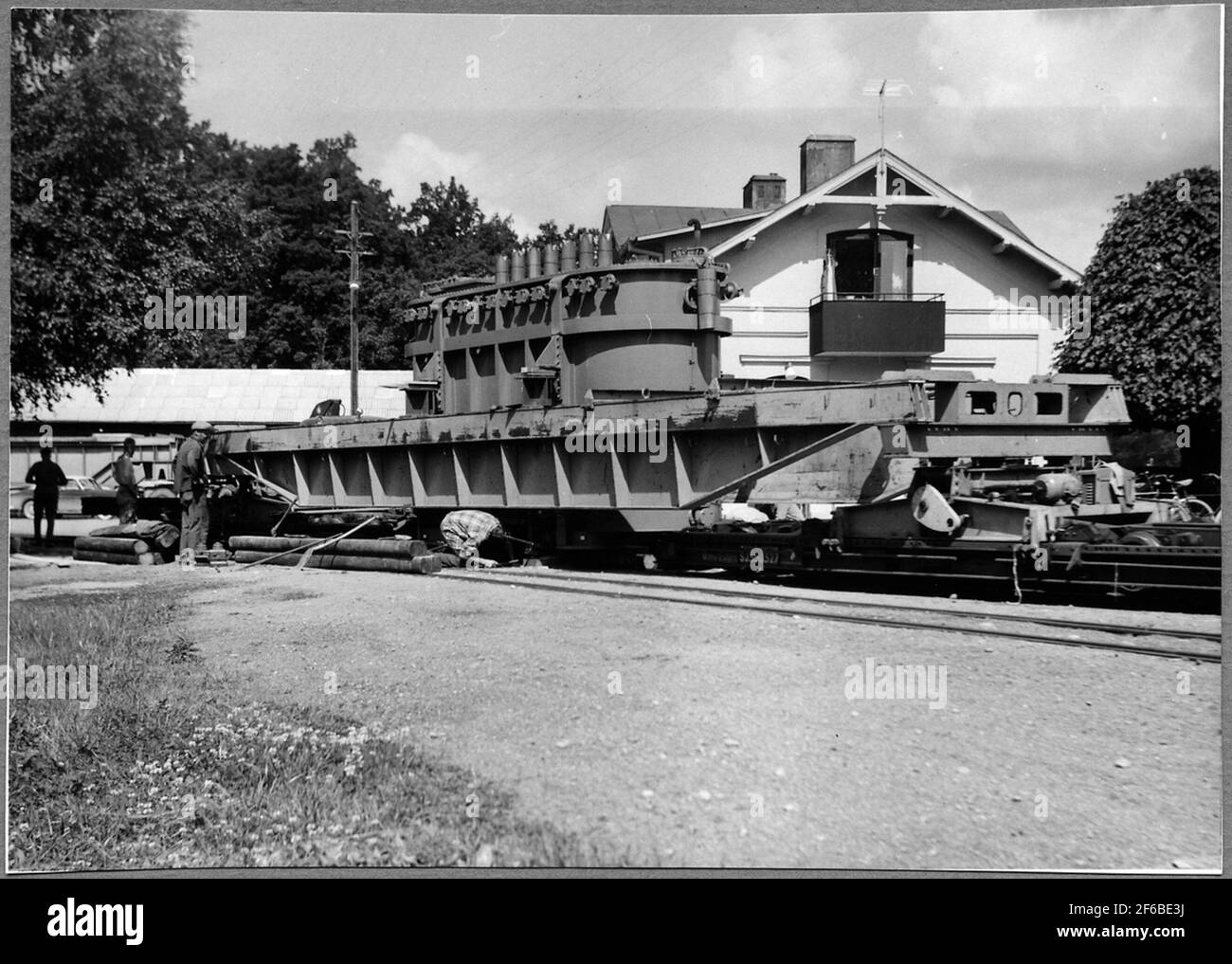 Transformer loaded on two transmission wagons during unloading at ...