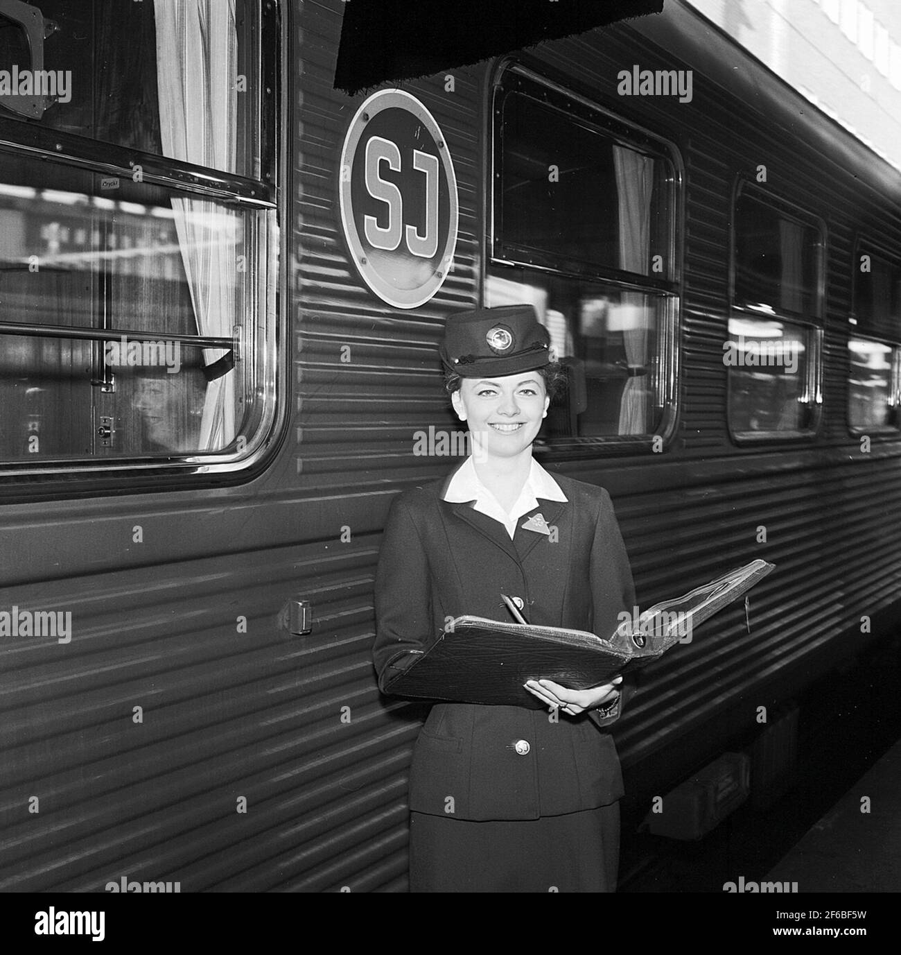 Train station hostess hi-res stock photography and images - Alamy