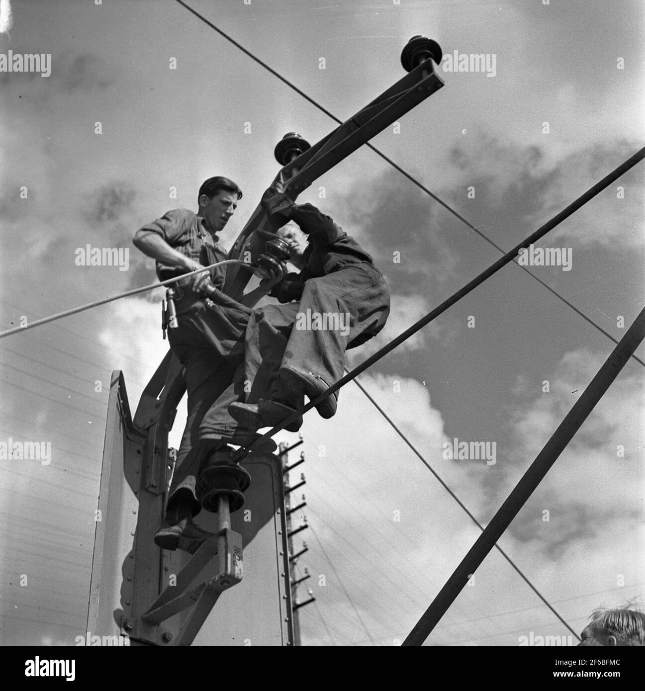 Electrification of the Angle Sundsvall line. Mounting work. Attachment ...