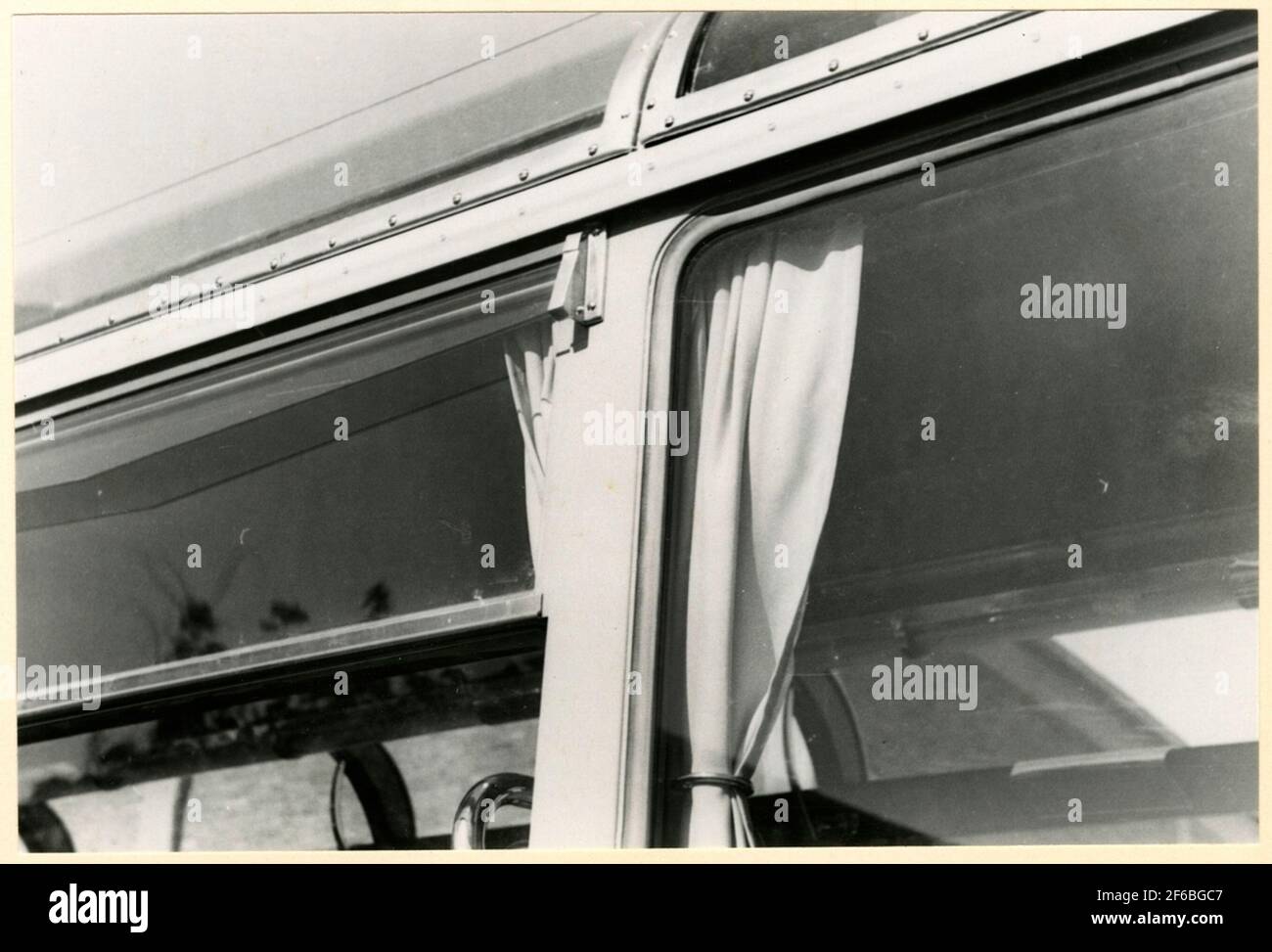 Window and curtain on bus seen from the outside Stock Photo - Alamy