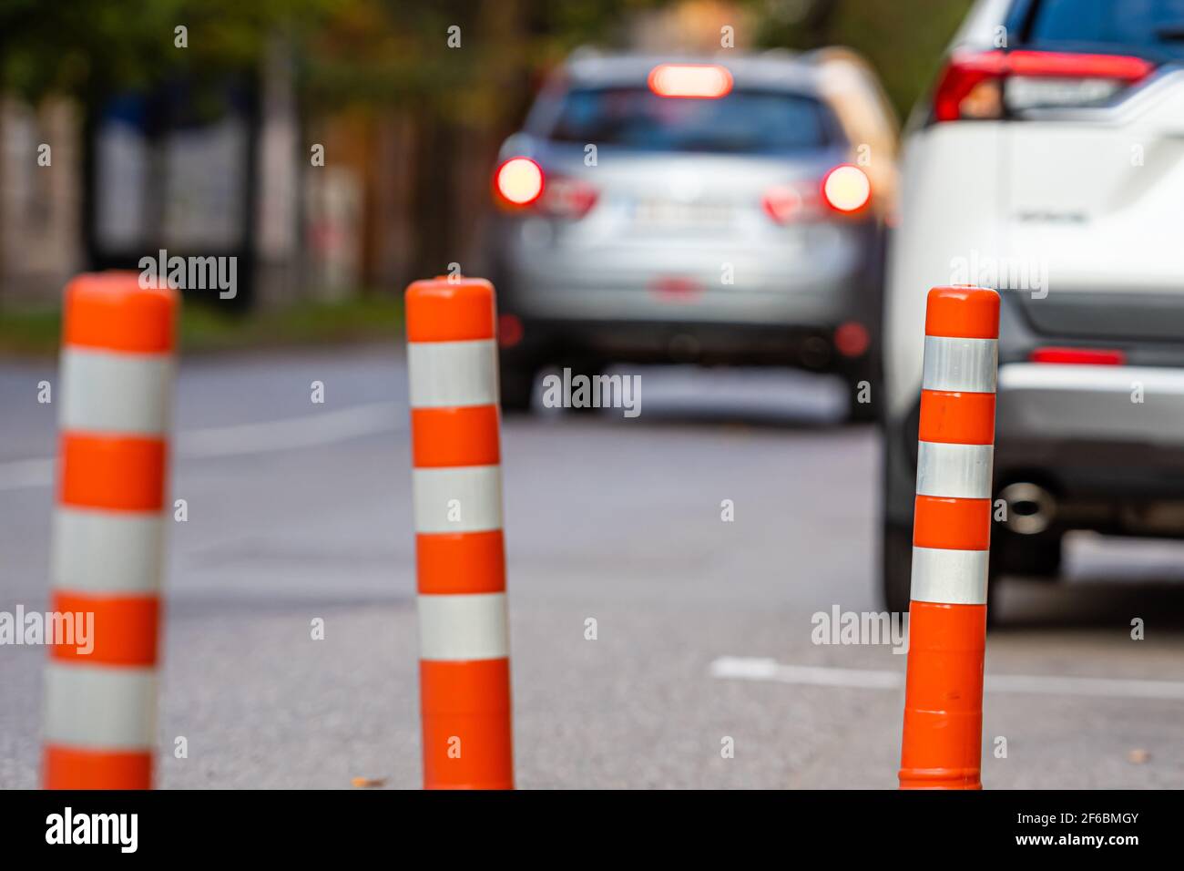 Red and white traffic bollard hi-res stock photography and images - Alamy