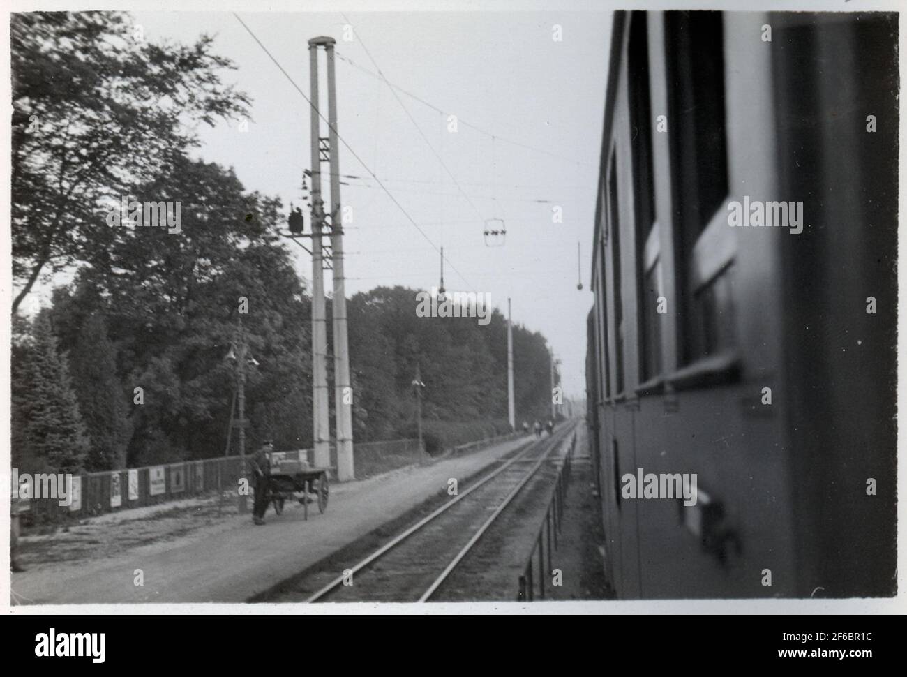 Concrete posts with light transformer at railway yard between Munich ...