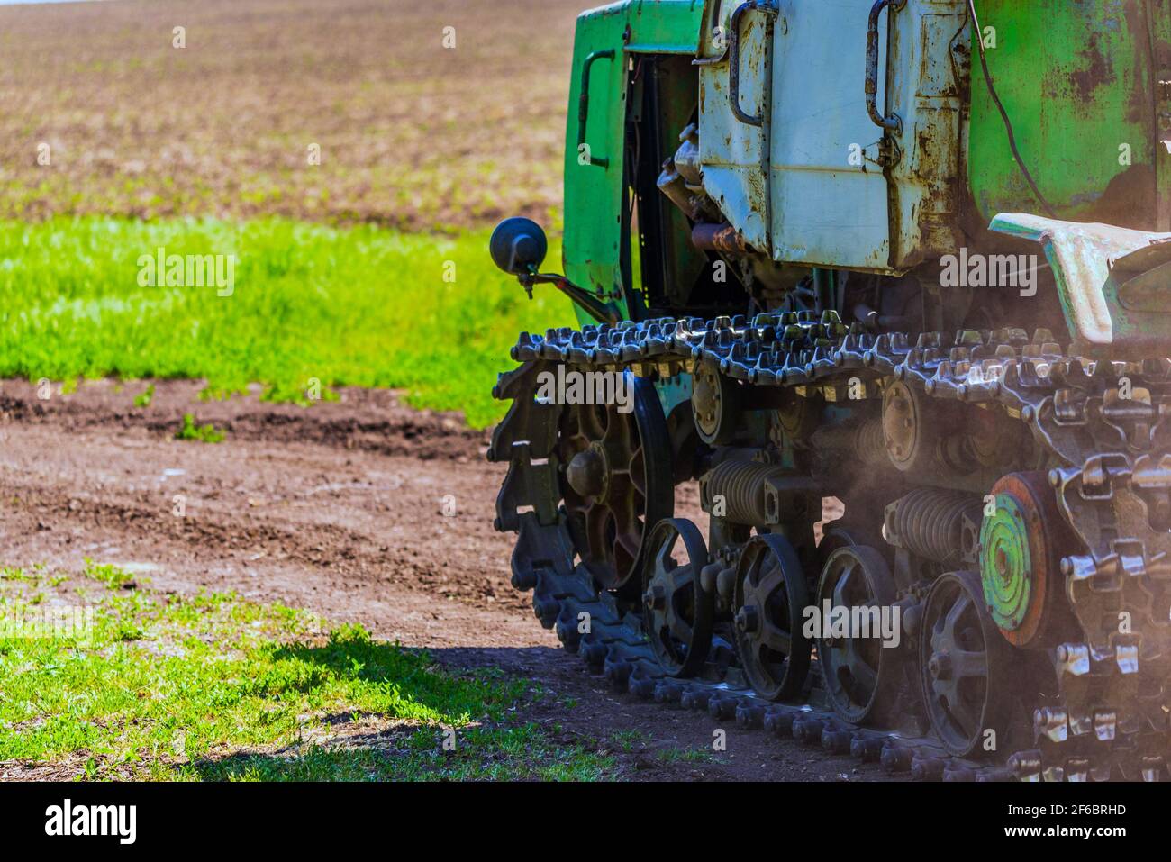 Continuous caterpillar tracks of the bulldozer. Close up detail of a ...