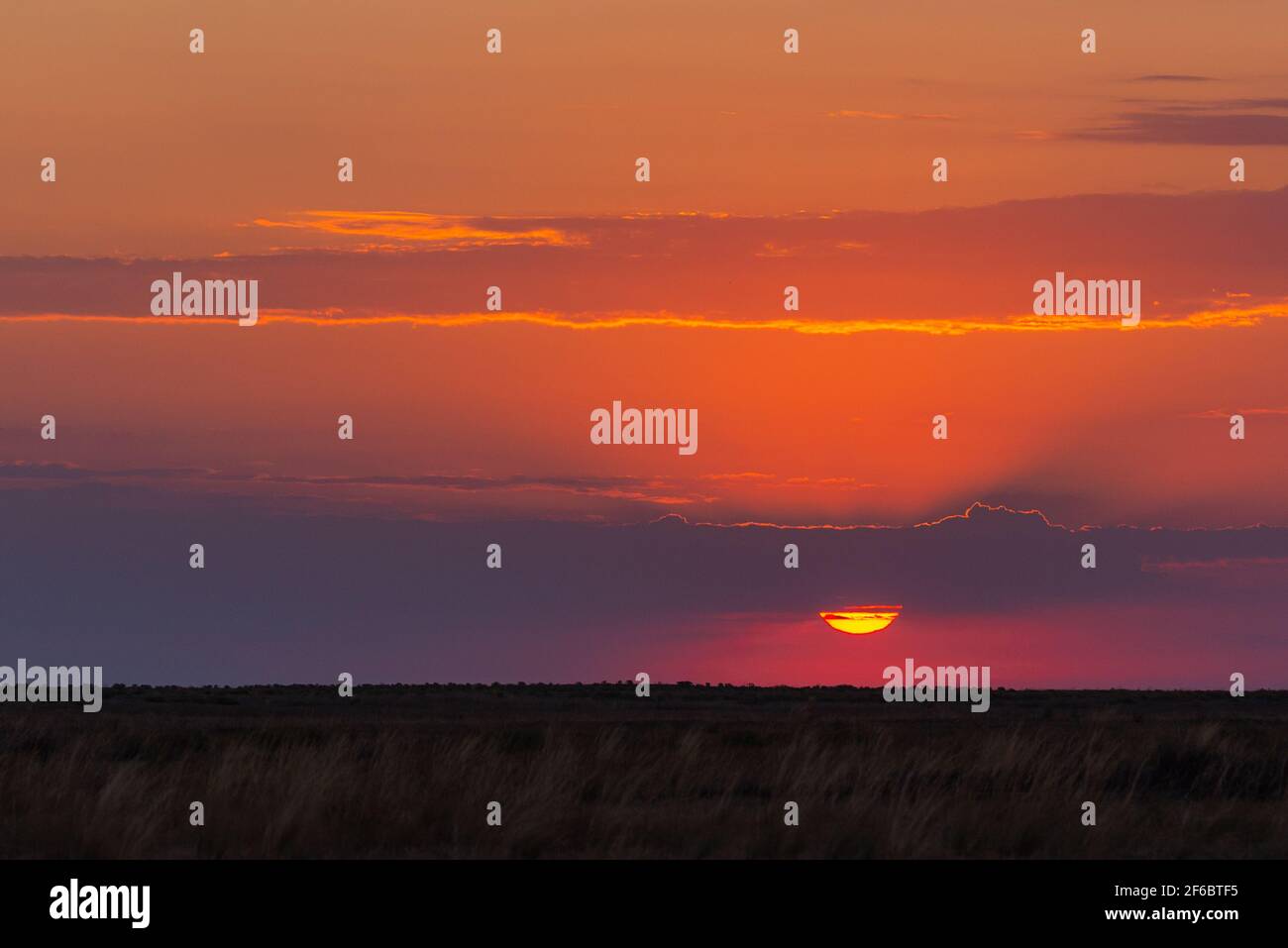 red sunset sky stormy clouds. Natural background landscape Stock Photo ...