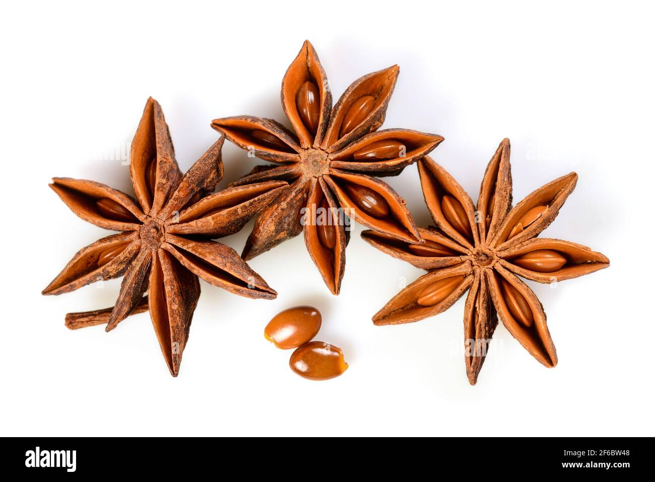 Star anise. Three star anise fruits with two seeds. Macro close-up ...