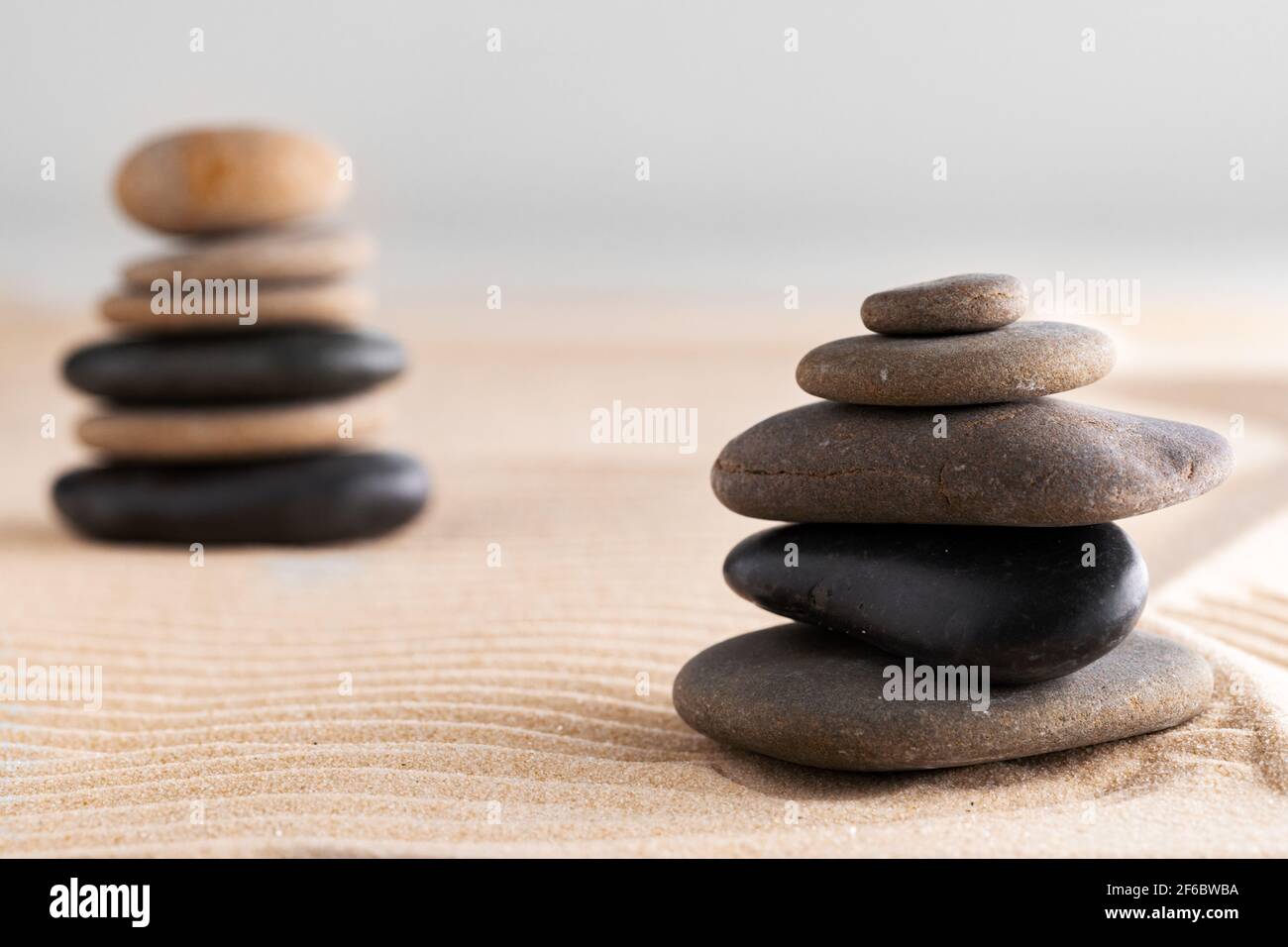 Japanese zen garden with stone in raked sand Stock Photo - Alamy