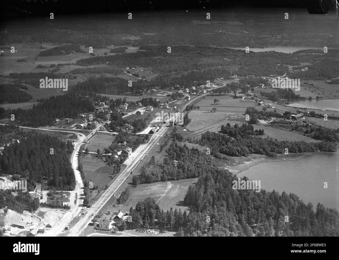 Aerial view of station site arranged in 1903. Stationhouse in two ...